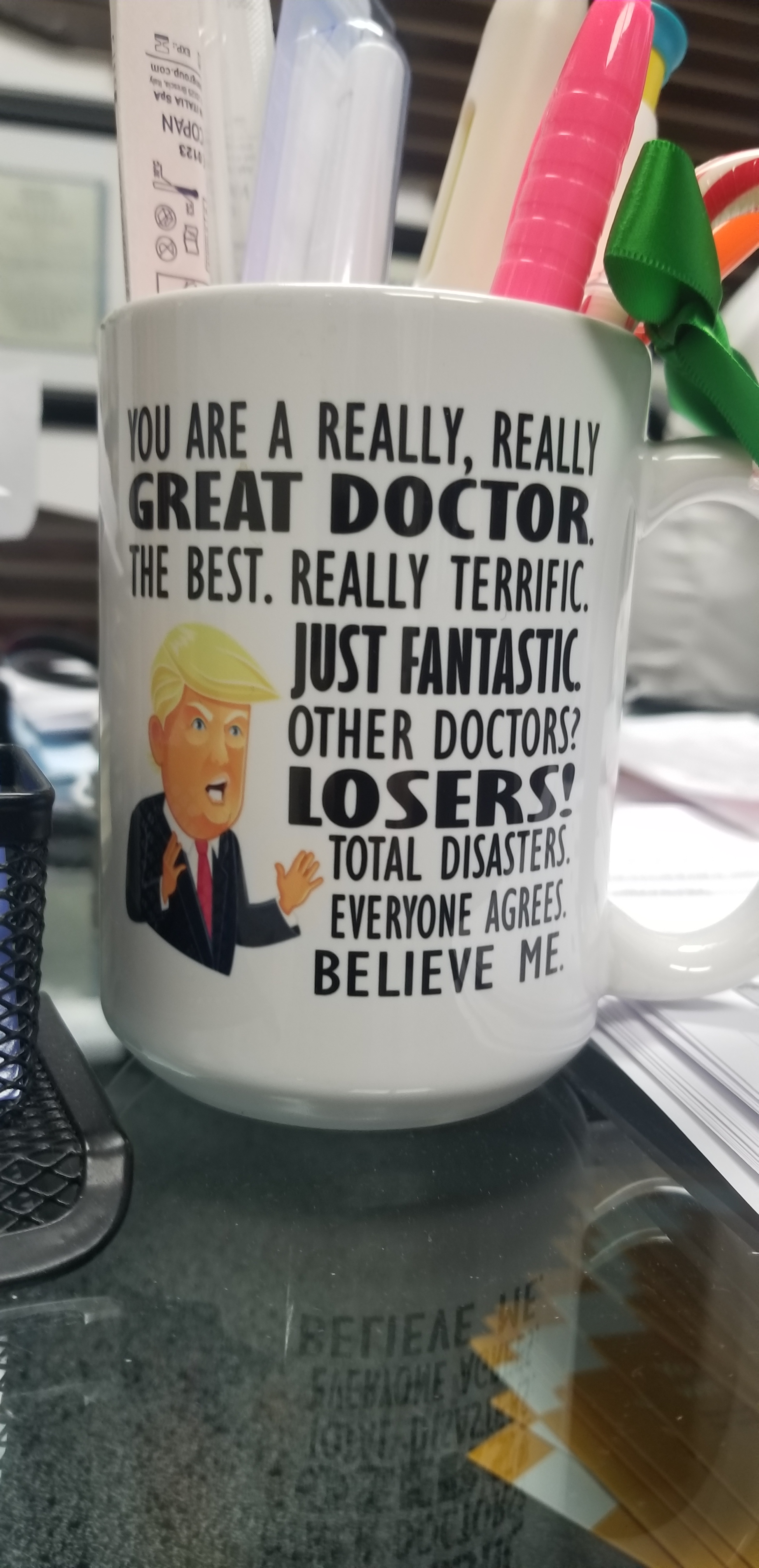 This explains why the doctor was wearing his mask as a chin diaper ...